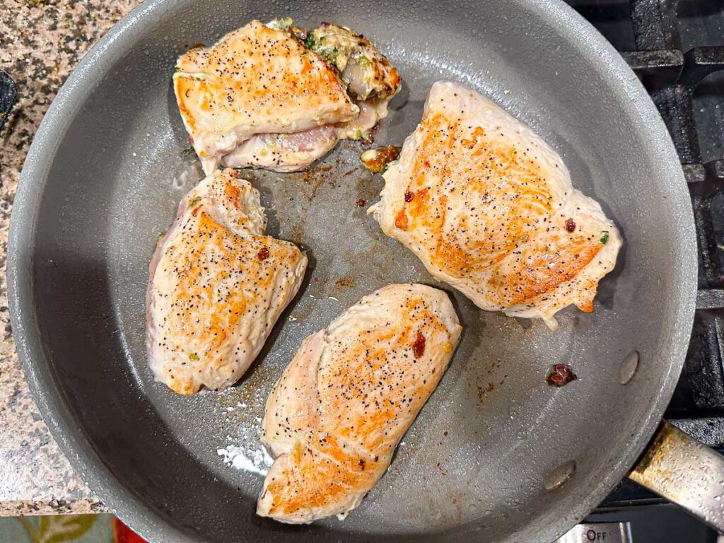 Olive Tapenade Stuffed Chicken with Artichokes & Creamy Spinach